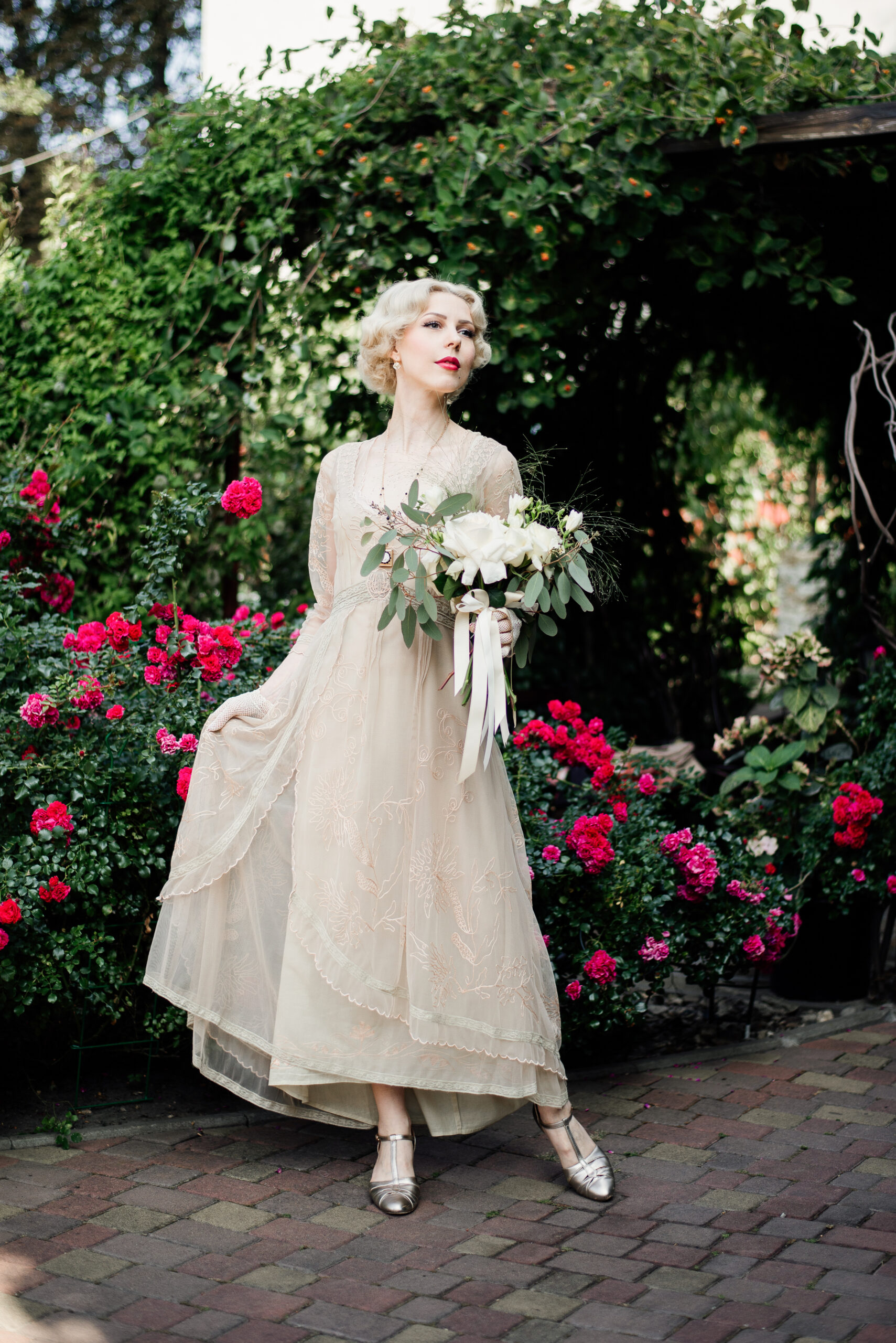 Fiore Vanil wearing the Downton Tea Party Gown | PreOwned Wedding Dresses