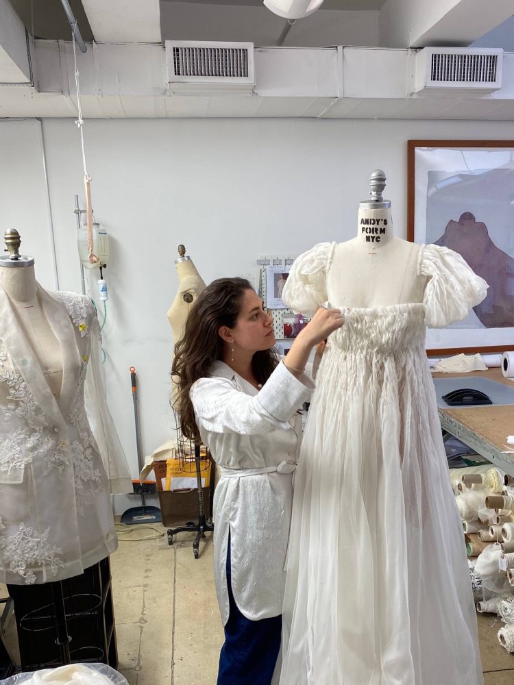 Designer Danielle Hirsch working on a bridal gown | PreOwned Wedding ...